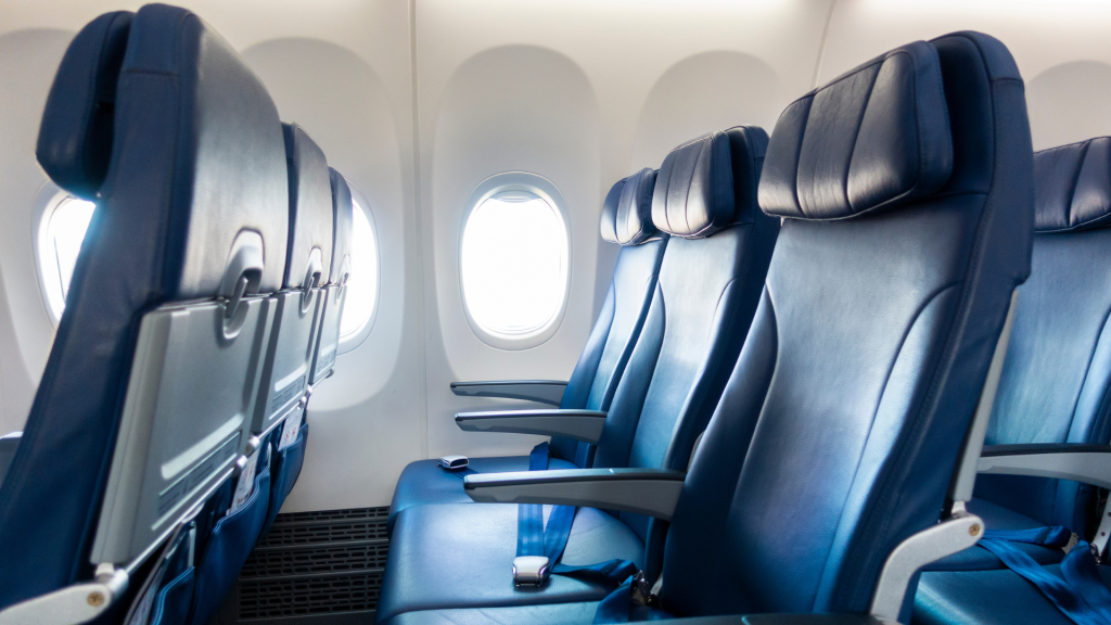End the Debate: Who Gets the Armrests on a Flight? - Nomadic News